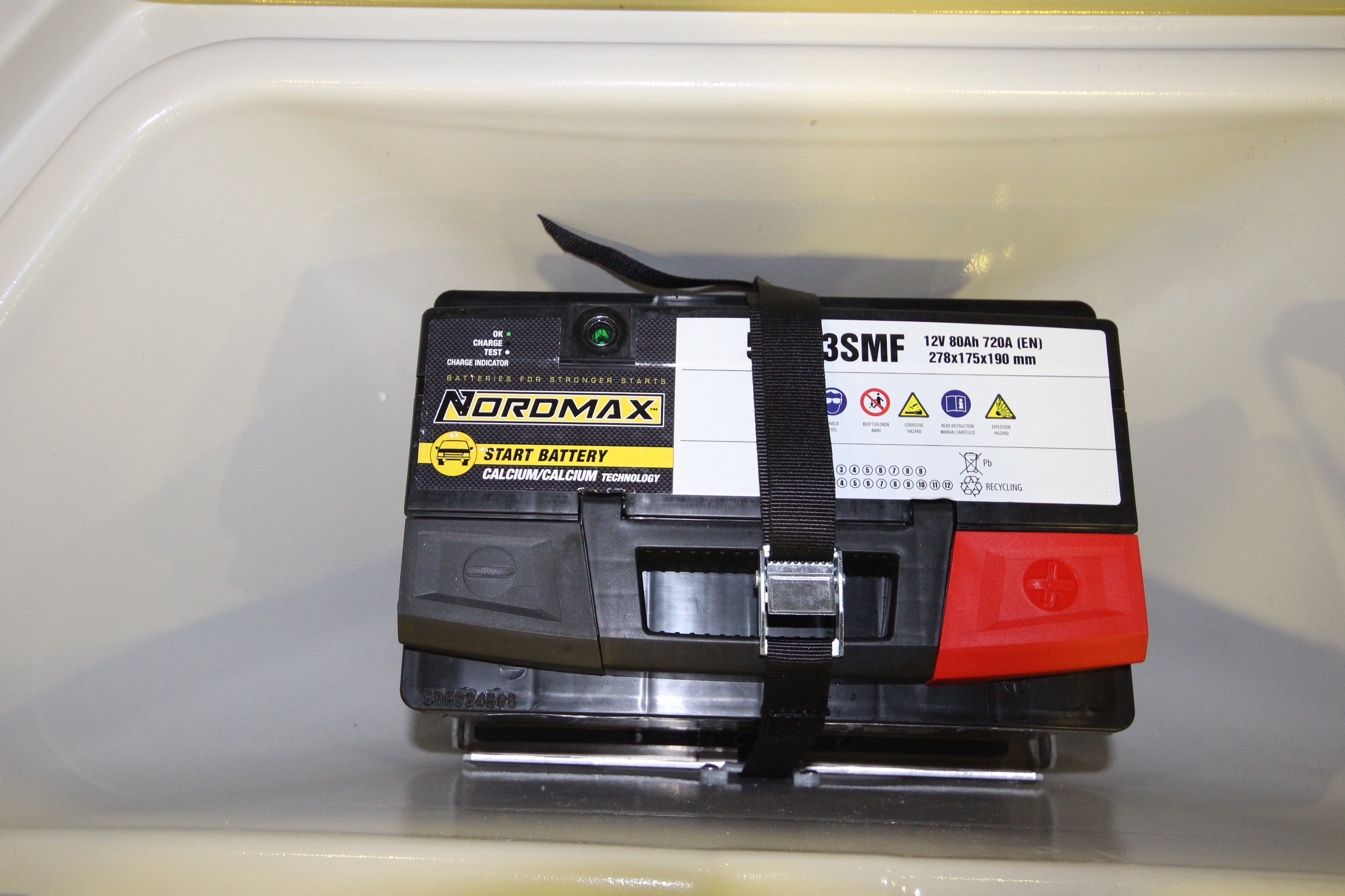 Fastening bed for battery under front | Terhi